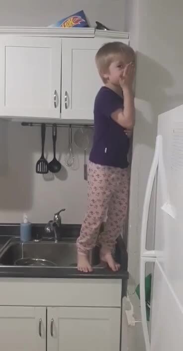 Kid Slips And Falls Off Kitchen Slab While Walking On It | Jukin Licensing