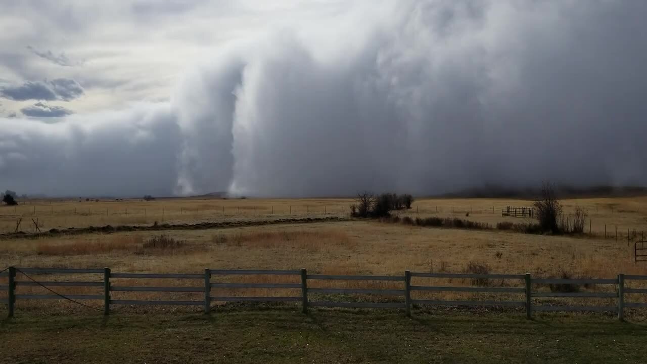 Squall Cloud Sweeps Across the Field and Obscures Visibility | Jukin ...