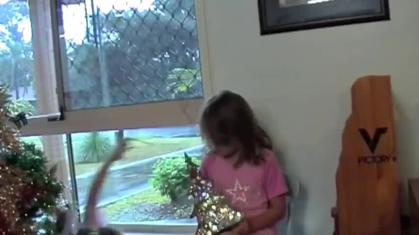 Little Girl Falls Off Chair Onto Christmas Tree | Jukin Licensing