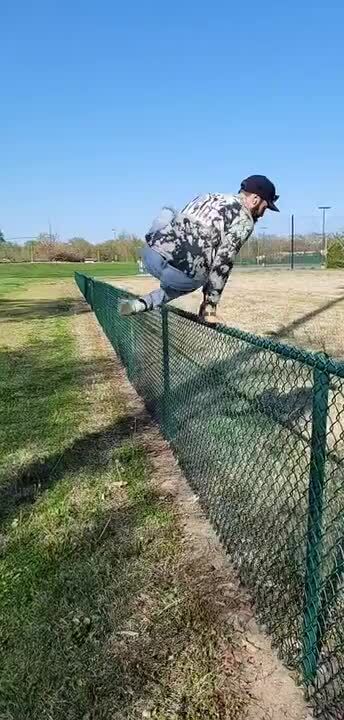 Guy Falls Hilariously While Attempting to Jump Over Fence | Jukin Licensing