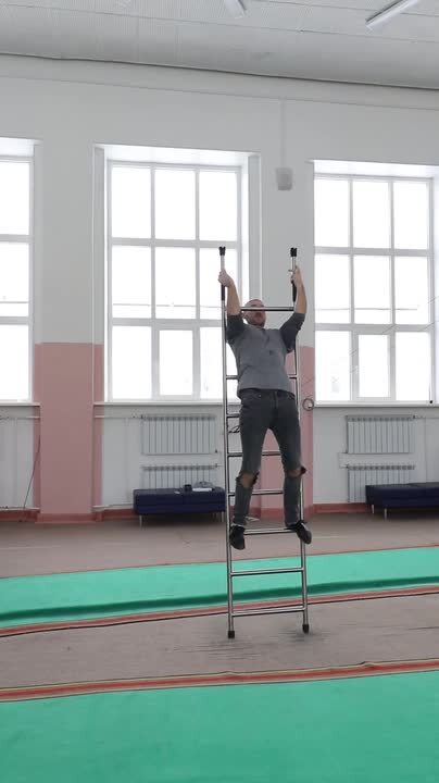 Man Performs Unique Tricks With Free Standing Ladder | Jukin Licensing