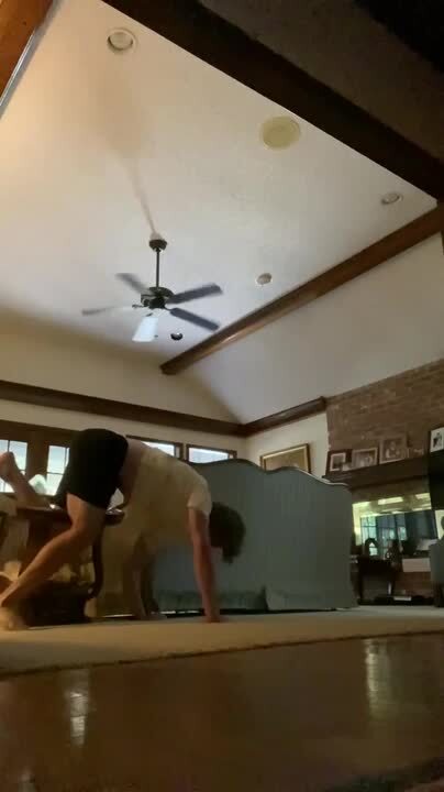 Guy Shatters Glass Table While Practicing Handstand | Jukin Licensing