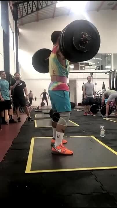 Man With One Arm Lifts Heavy Barbell at Gym | Jukin Licensing