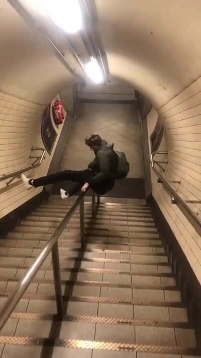Guy Hilariously Falls While Sliding Down Rail | Jukin Licensing