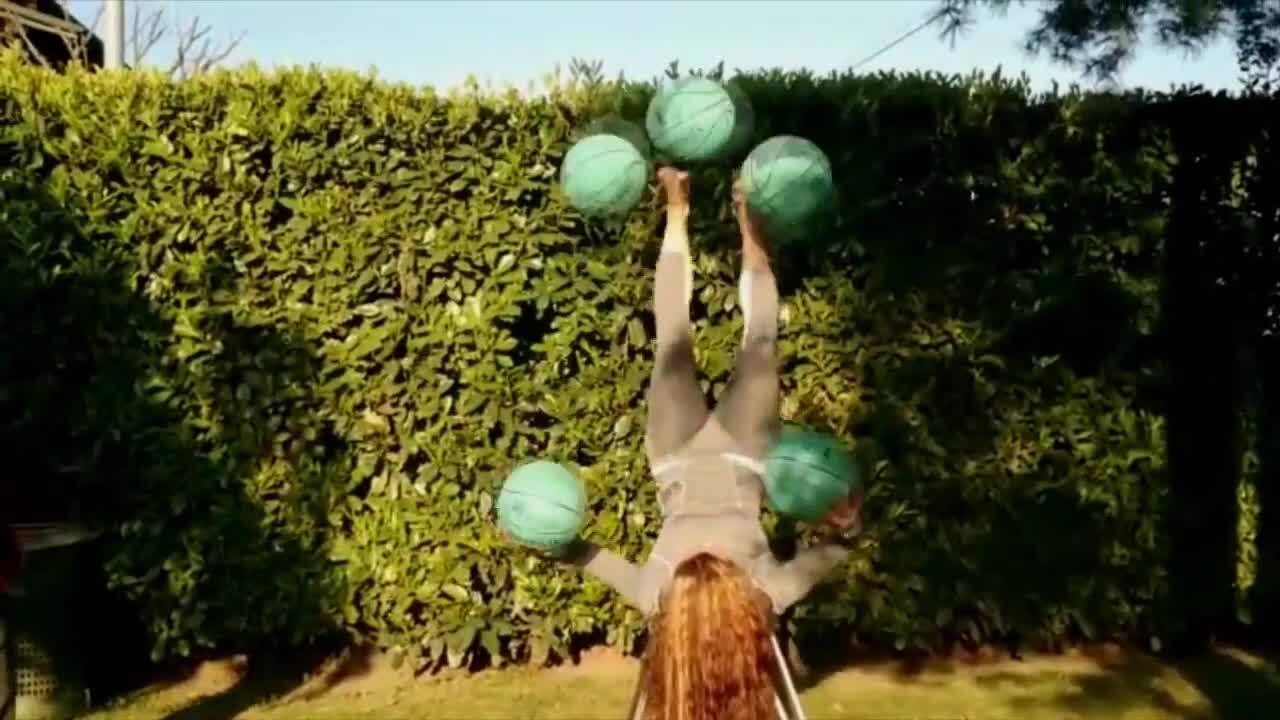 Girl Juggles Balls with Limbs | Jukin Licensing