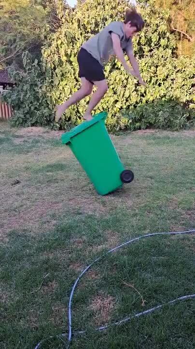 Person Tries to Jump Atop Trash Can But Ends up Falling | Jukin Licensing