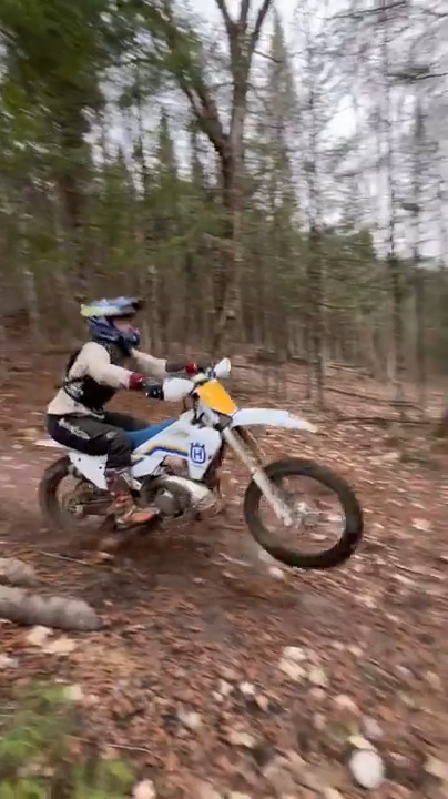 Person Crashes Dirt Bike Into Tree After Attempting Jump Off Ramp ...
