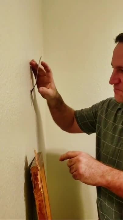 Easy Trick to Hang Picture Frame on Wall Using a Fork | Jukin Licensing