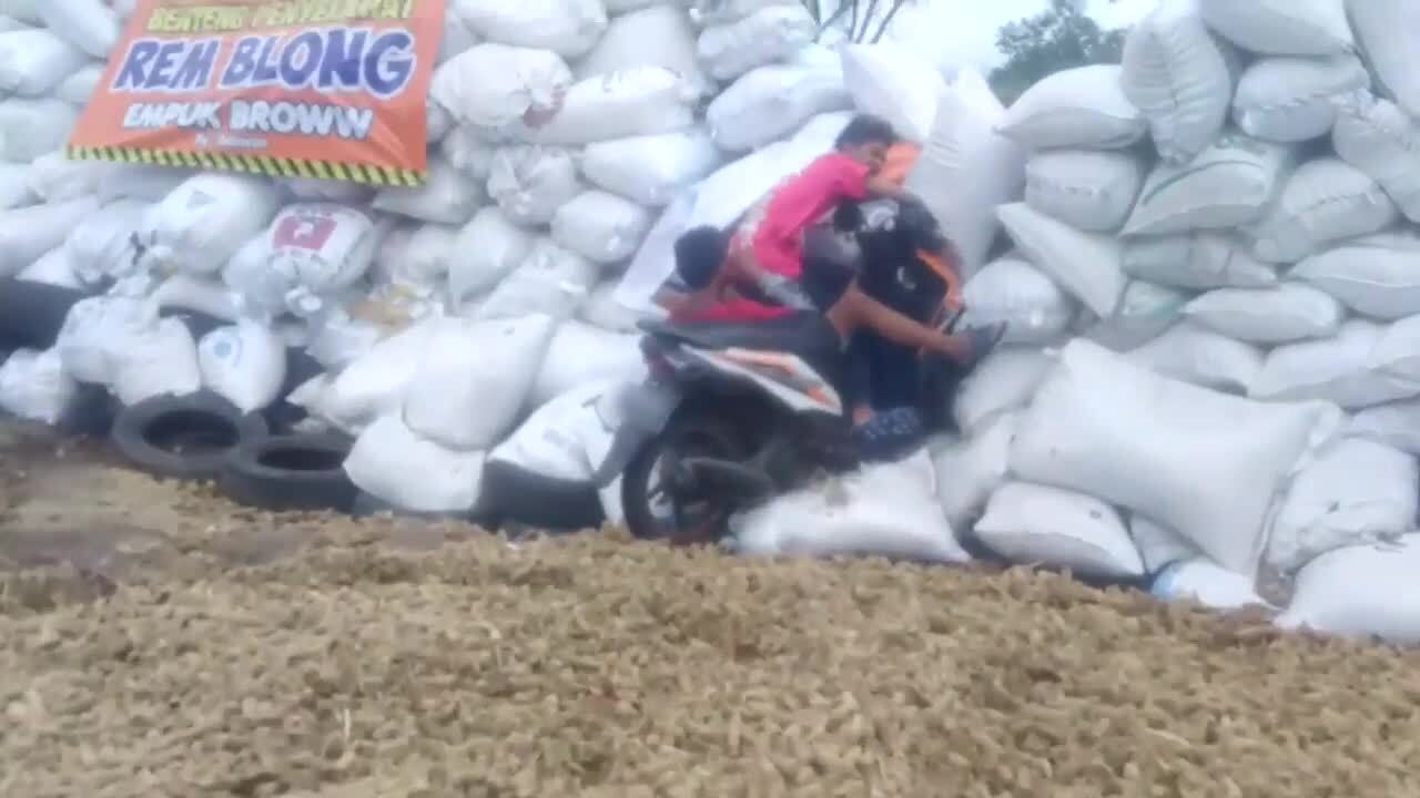 Motorcycle Crashes into Protective Barrier | Jukin Licensing