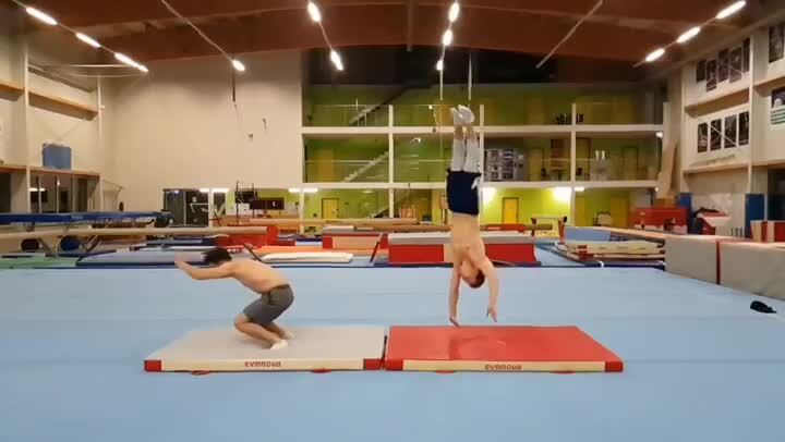 Acrobat Duo Perform Coordinated Flip Over Each Other | Jukin Licensing