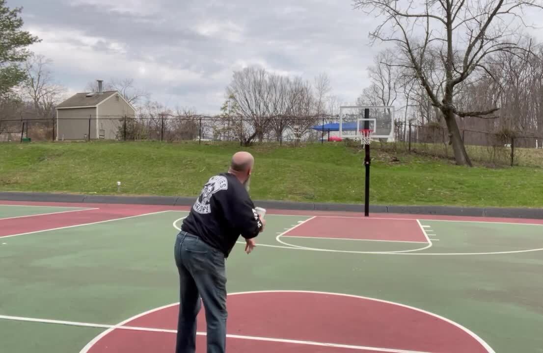 Man Performs Amazing Half Court Basketball Trick Shot | Jukin Licensing