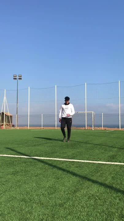 Guy Performs Amazing Bottle Kick While Playing Football | Jukin Licensing