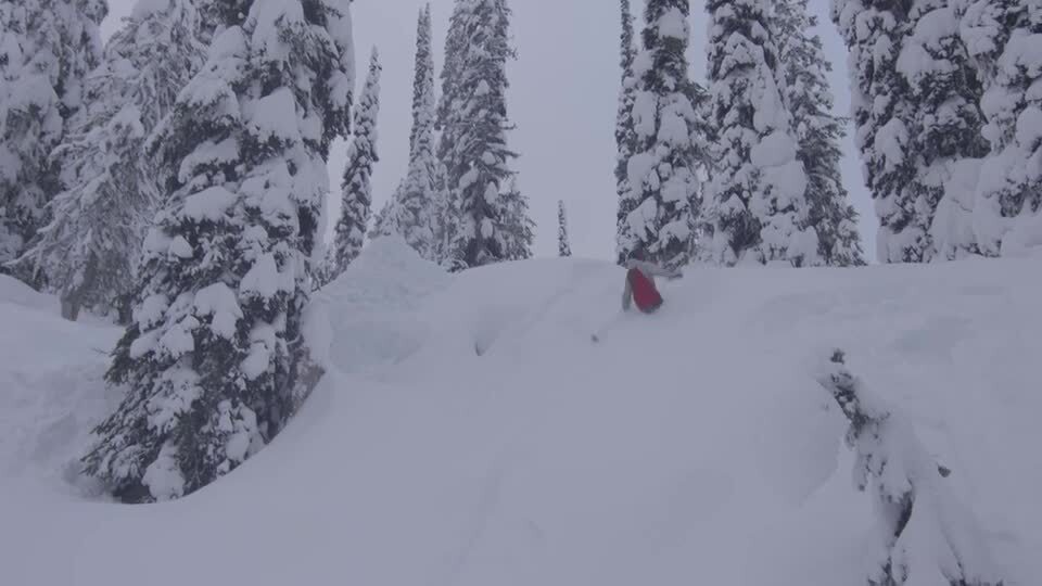 Depression Forms in Snow as Skier Falls into it After Jumping From Snow ...