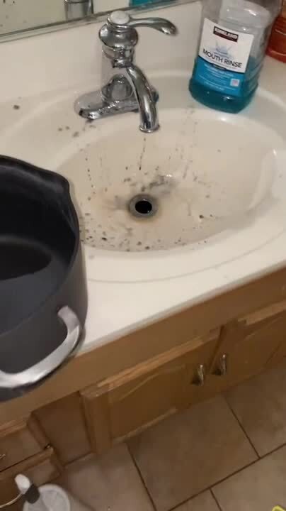 Person Trying to Unclog Drain Accidentally Causes Explosion of Black ...