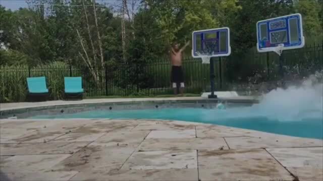 Guy Does Series of Creative Slam Dunks in Swimming Pool | Jukin Licensing