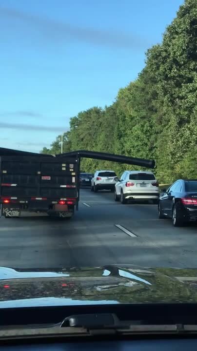 Clueless Driver Hits Cars with Pipe | Jukin Licensing