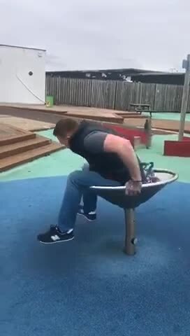 Man Gets Dizzy After Spinning on Roundabout and Falls Faltering on ...