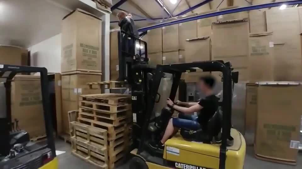 Two Girls Fall off Fully Raised Forklift | Jukin Licensing
