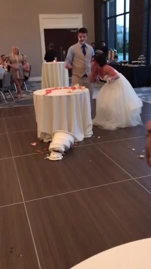 Bride and Groom Have Cake Fight | Jukin Licensing