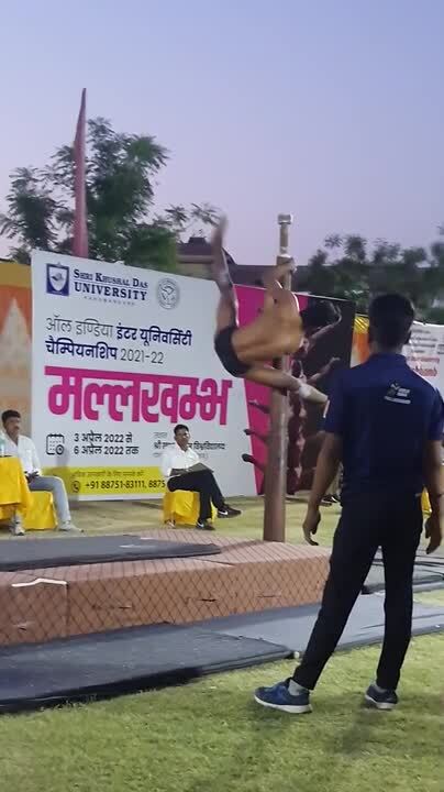 Calisthenic Athlete Flips And Holds Pole With His Legs During National ...