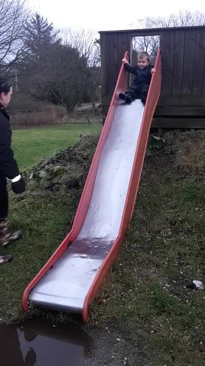 Kid Gets Wet at Bottom of Slide | Jukin Licensing