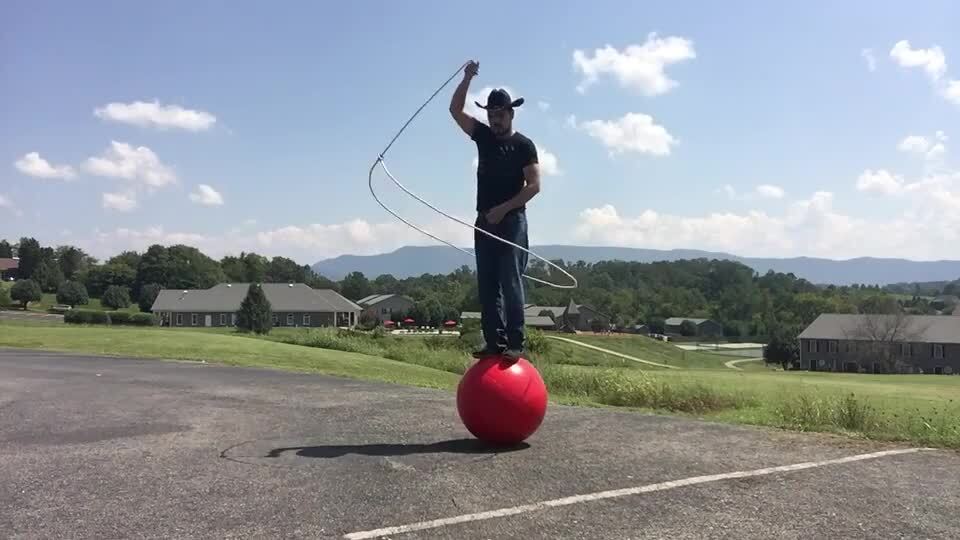 Cowboy Spins Lasso while Balancing on Ball | Jukin Licensing