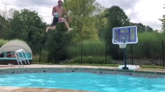 Guy Jumps Over Pool and Dunks Ball | Jukin Licensing