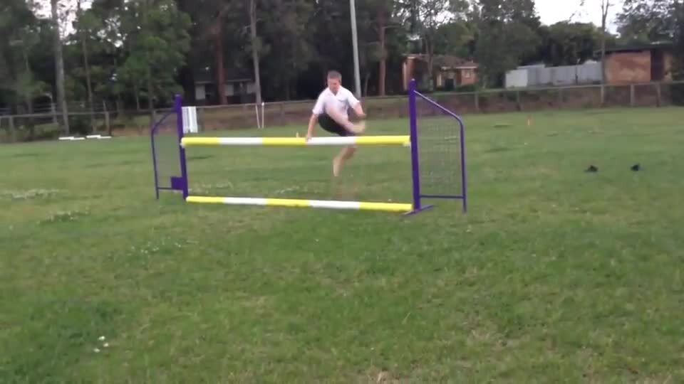 Guy Trips Gets Stuck on Hurdle and Falls | Jukin Licensing