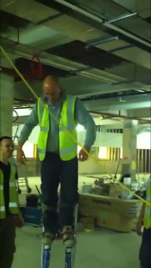 Construction Worker Falls While Walking on Stilts | Jukin Licensing