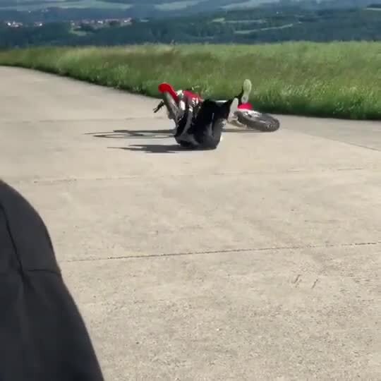 Guy Loses Control of Bike and Falls to the Ground While Attempting ...