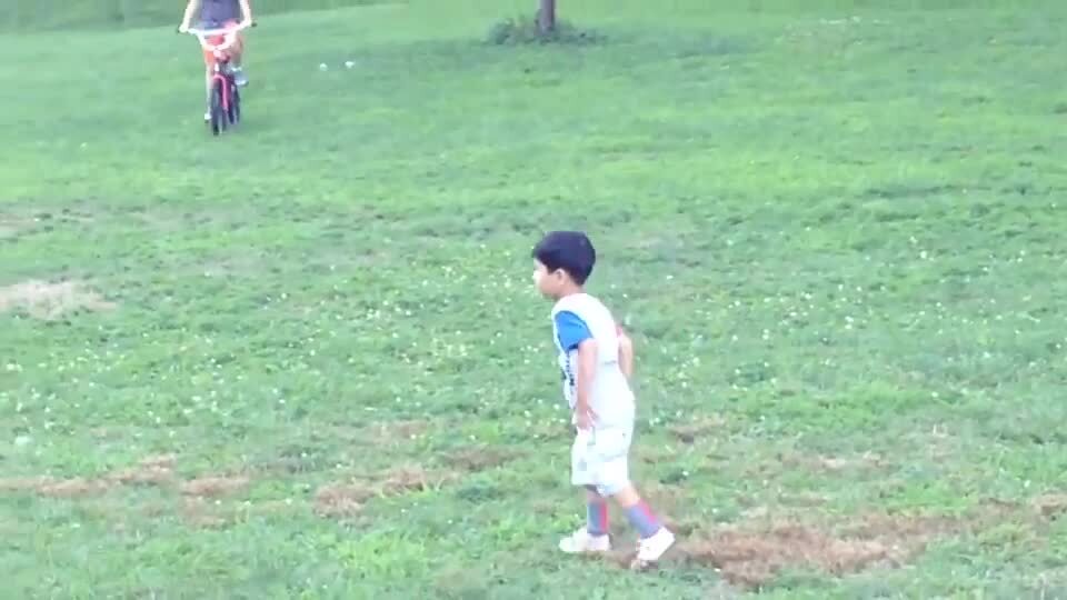 Kid Crashes his Bike Into Another Kid Playing Football | Jukin Licensing