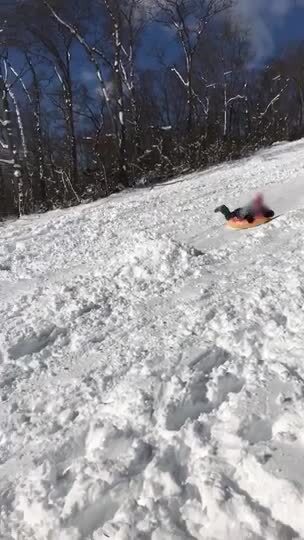 Guy Flies Off Inner Tube Into Snow | Jukin Licensing