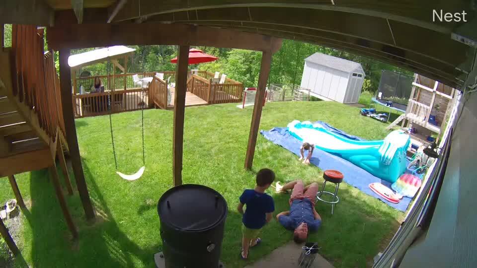 Dad Falls off Stool Attempting to Hang Climbing Rope in Backyard ...