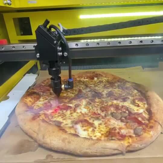 Pizza Gets Sliced by Laser | Jukin Licensing