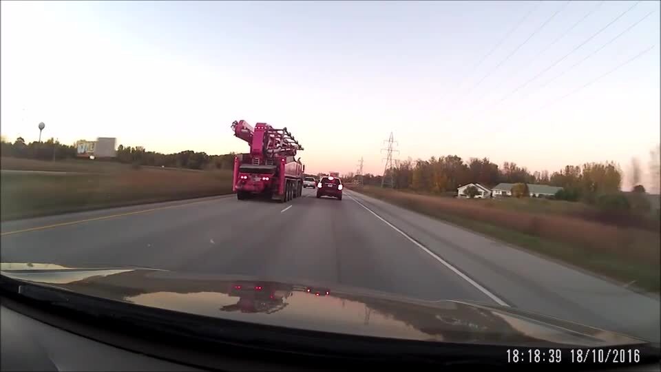 Car Cuts Off Big Rig | Jukin Licensing