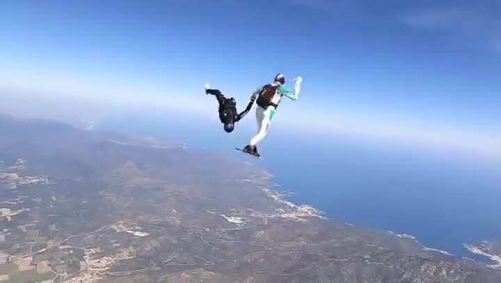 Skydiver Rides Board While Still Being Mid-Air | Jukin Licensing