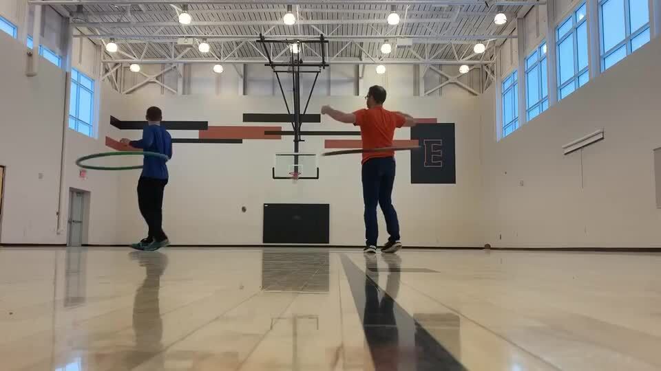 Brothers Amazingly Throw Footballs in Basketball Hoop While Hula ...