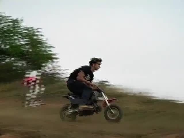 Guy Rides Mini Bike off a Cliff | Jukin Licensing
