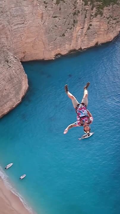 Guy Goes Base Jumping Off High Mountain Cliff | Jukin Licensing