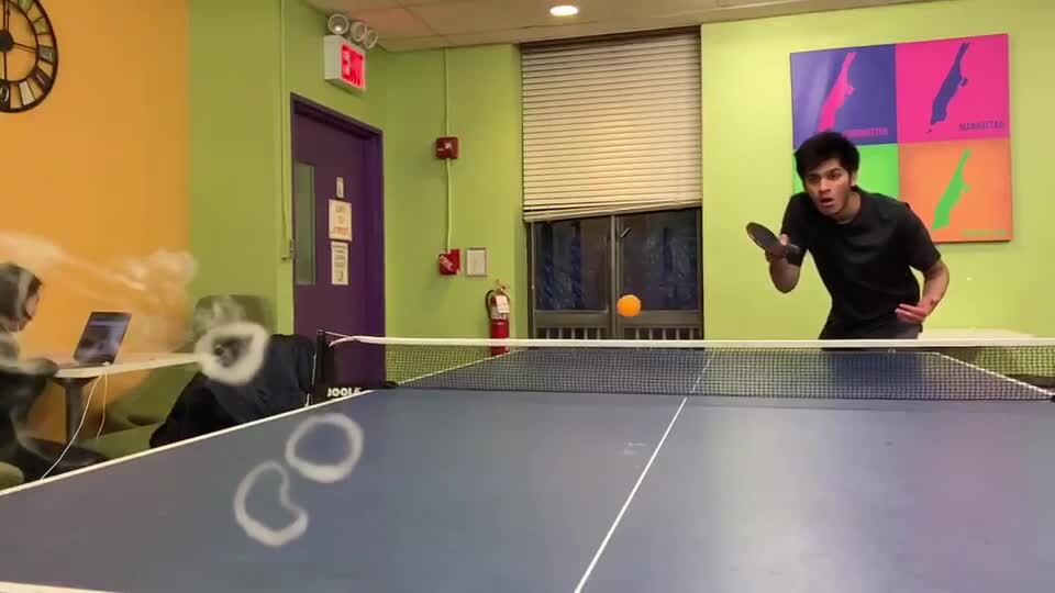 Guy Makes Ping Pong Trick Shot Through Smoke Ring | Jukin Licensing