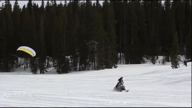 Snowmobile Pulls Paraglider and Both Fail | Jukin Licensing