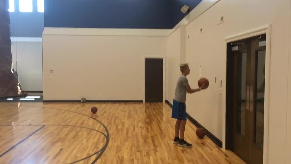 Kid Fails to Shoot Basketball Into Hoop Backwards | Jukin Licensing