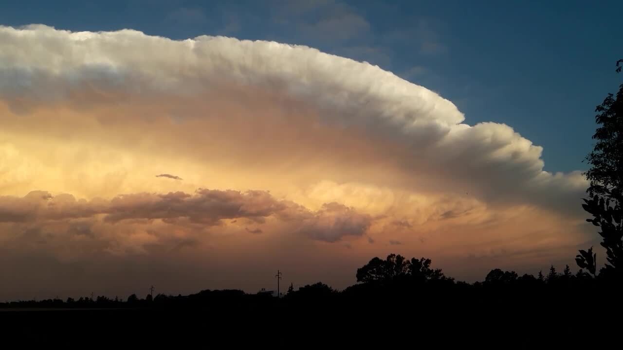 Beautiful Cumulonimbus Storm Illuminates in Sunset | Jukin Licensing