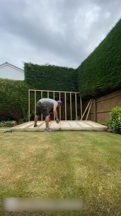 Person Builds Outdoor Cabin in Garden | Jukin Licensing