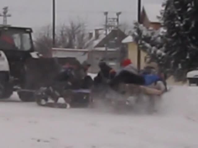 Friends Enjoy Snow Day and Go Sled-Skitching | Jukin Licensing