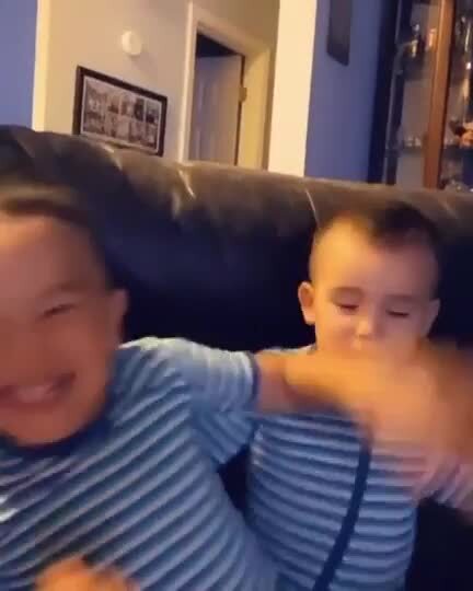 Twin Kids Playfully Slap Each Other | Jukin Licensing