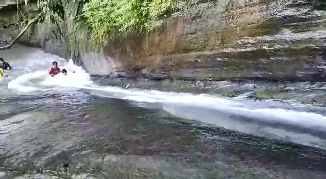 Guys Tumble Into Lake One After Other While Sliding Over Slippery ...