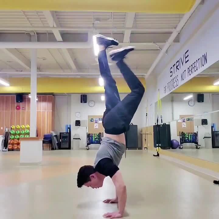 Guy Walks Mid-Air While Attempting Handstand | Jukin Licensing