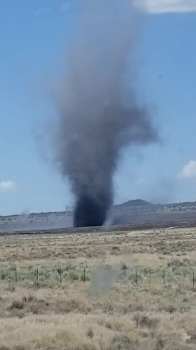 Black Dust Devil Whirling Over Field in Nevada | Jukin Licensing