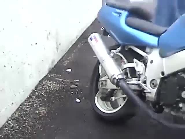 Motorcycle Slides into Wall | Jukin Licensing